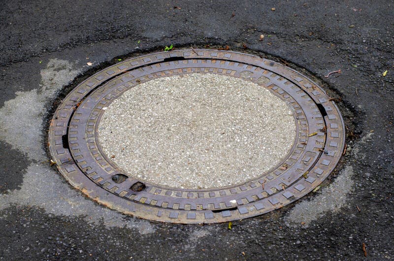 Manhole Sewer in Germany on the Road Stock Image - Image of road ...