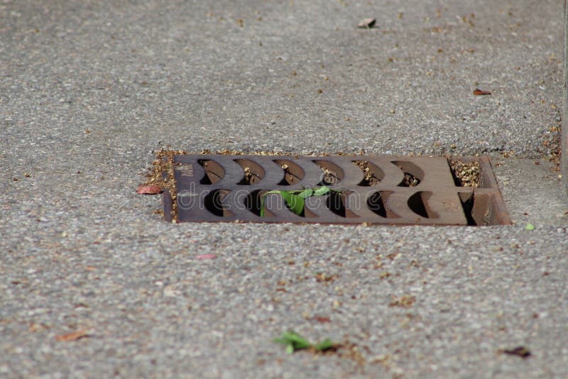 Manhole on a street stock photo. Image of sewer, street - 82549284