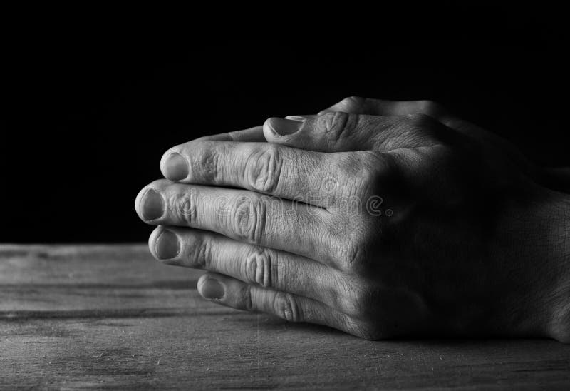 Mani Piegate Per La Preghiera Fotografia Stock - Immagine di fedele ...