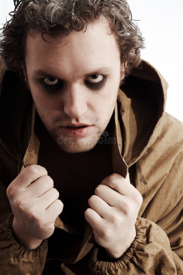 Maniac frowningly staring stock image. Image of grimace - 4667735