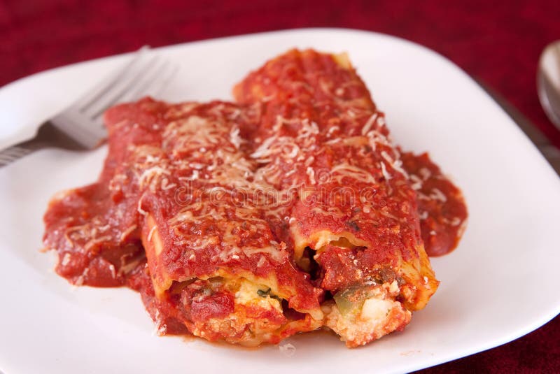 Manicotti dinner stock image. Image of parmesan, delicious - 15229279