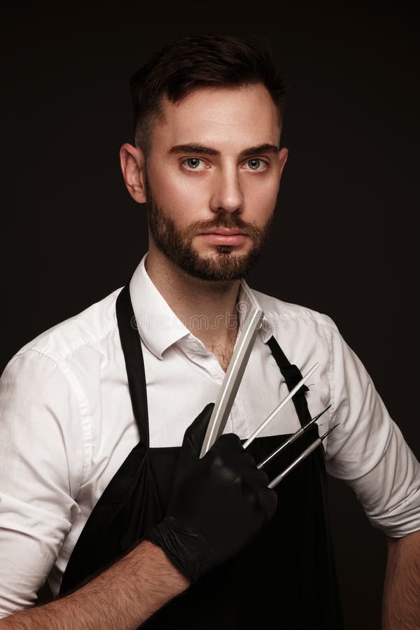 Manicur Master Man in Working Form with Tools in Hand. Nail Photo ...