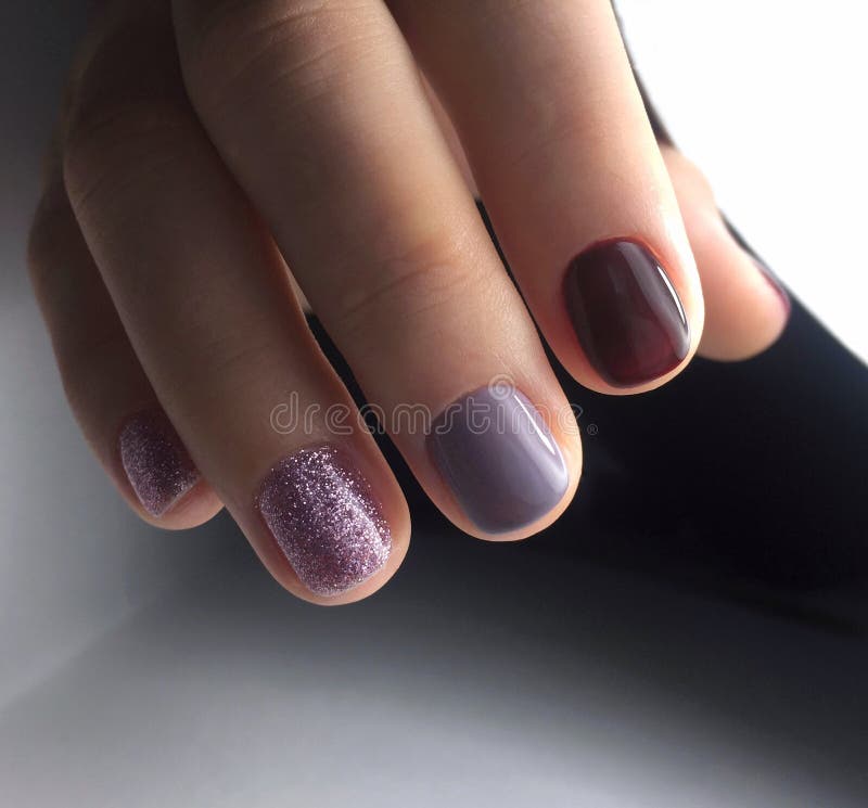 Manicure of Different Colors on Nails. Female Manicure on the Hand ...