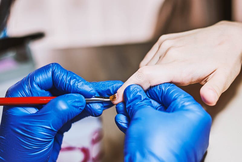 Manicure Master Applying Cuticle Cream on Client Nails Stock Image ...
