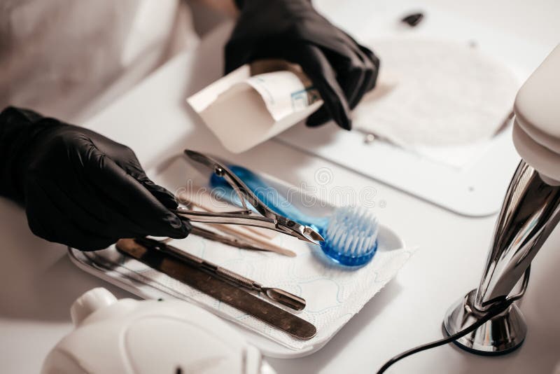 Manicure Master Hand Lay Out Sterilizing Manicure Tools from Craft ...