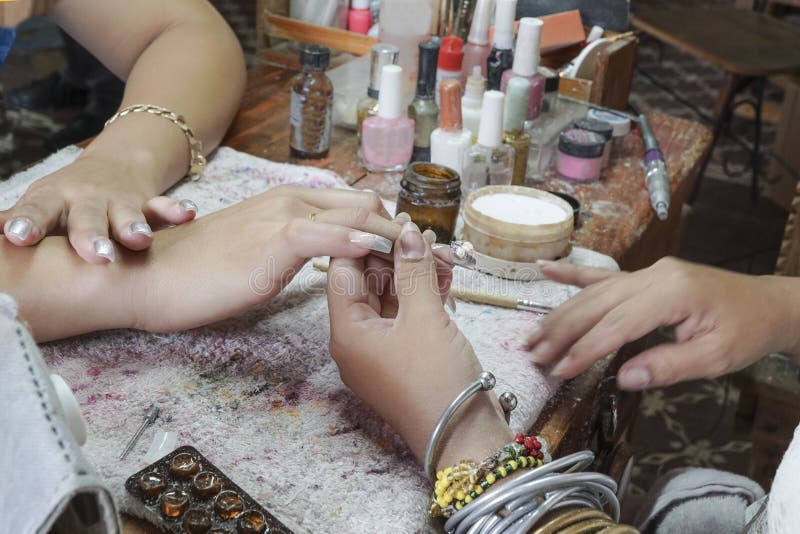 Manicure Process in a Beauty Salon Showing Making of Artificial Nails ...