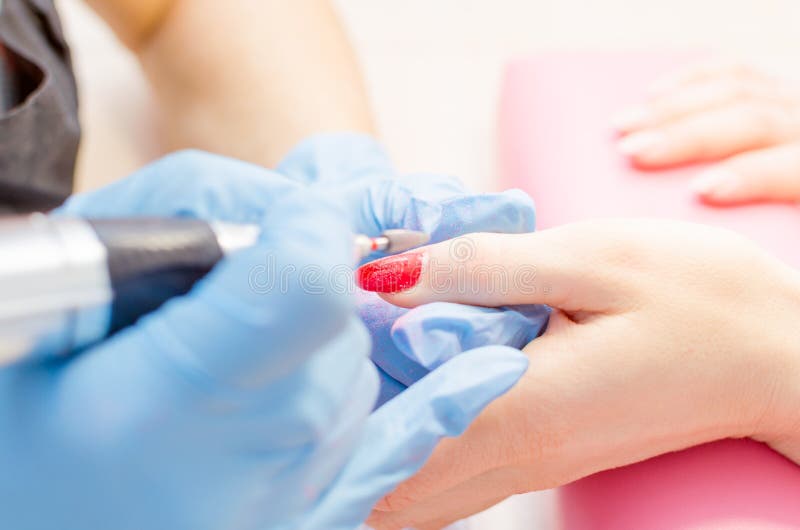 Manicure Process, Cleaning of Nails by a Milling Cutter Stock Photo ...