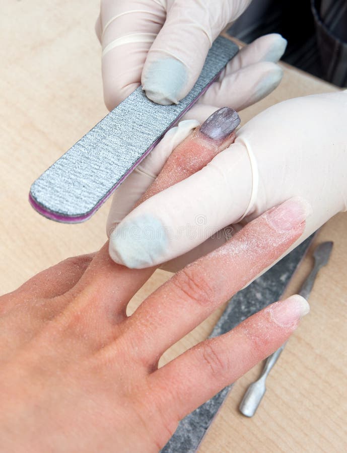 Manicure treatment stock photo. Image of manicure, holding - 18744534