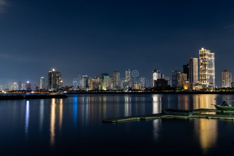 Manila Bay at Night in Philippines Stock Photo - Image of lights, city ...