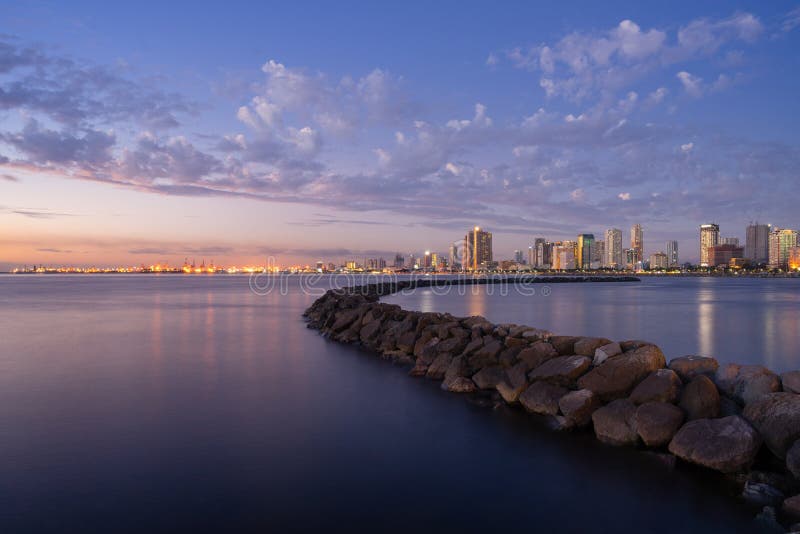 Manila Bay View during Sunset Stock Photo - Image of breakwater ...