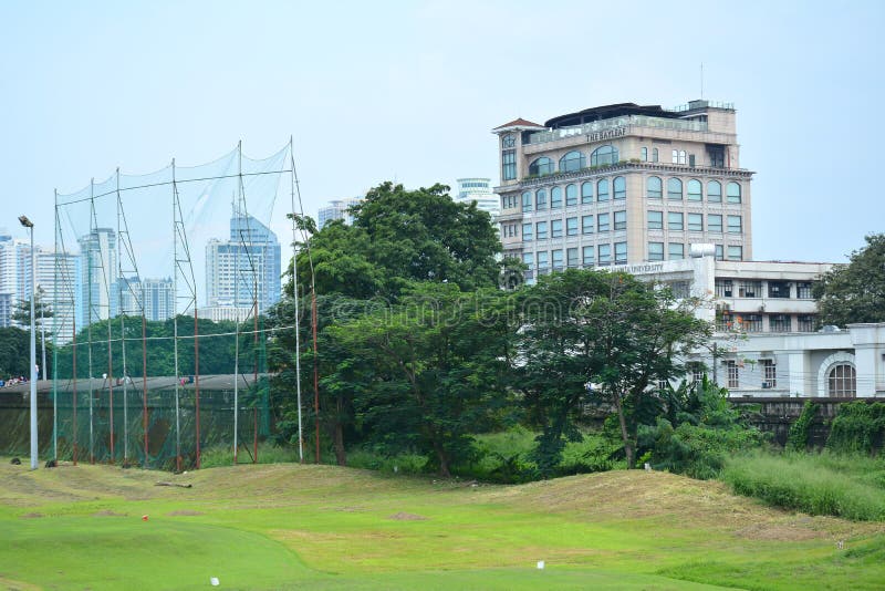 Golf Course with Trees, Mountain, and Lake at Mount Malarayat in Lipa ...