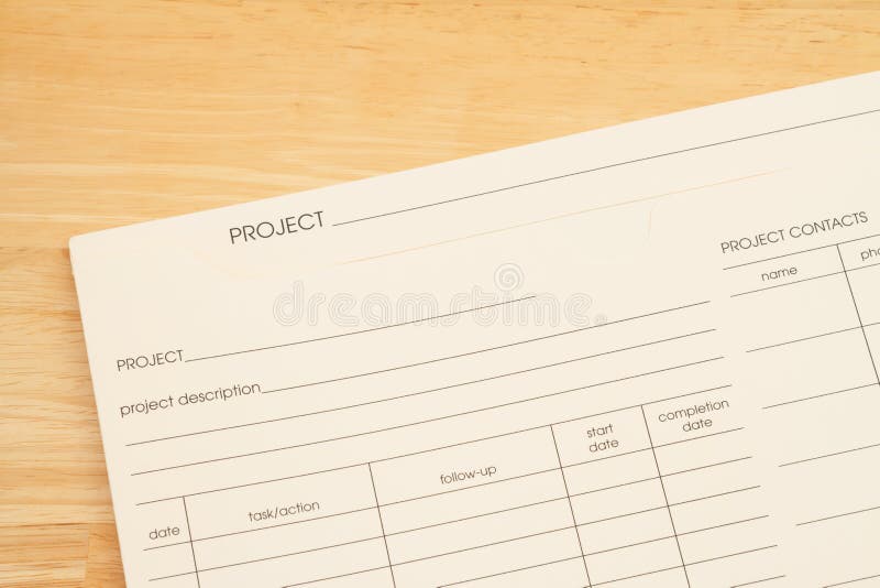 Manila Project Plan Folder on a Wood Desk Stock Image - Image of words ...