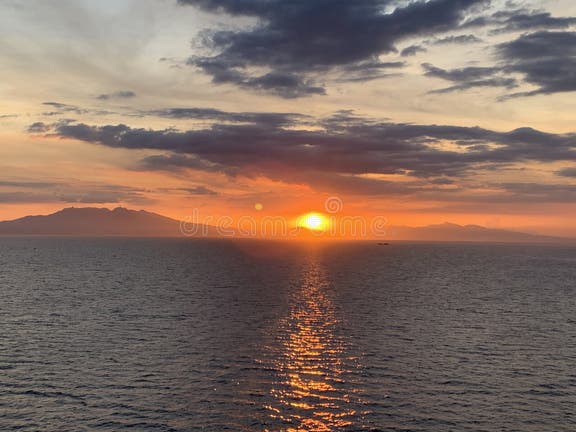 Manila Sunset stock image. Image of sunset, mountains - 250131439