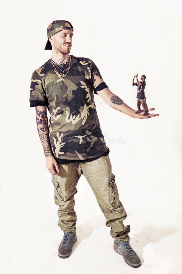 Manipulation of Two Rap Singers Posing in Studio Stock Photo - Image of ...