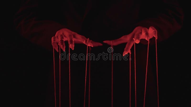 Manipulative Red Hand Shadows Casting Dramatic Strings Stock Photo ...