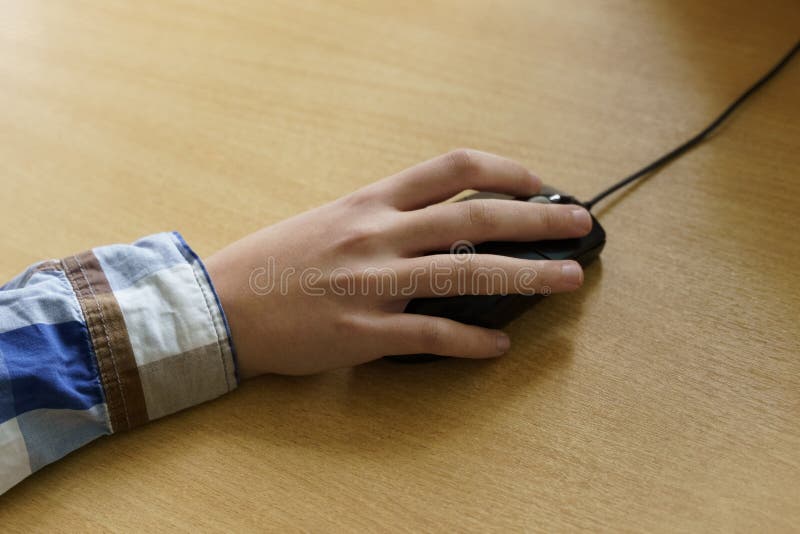 Manipulator Mouse in the Hand of a Child Stock Photo - Image of indoor ...