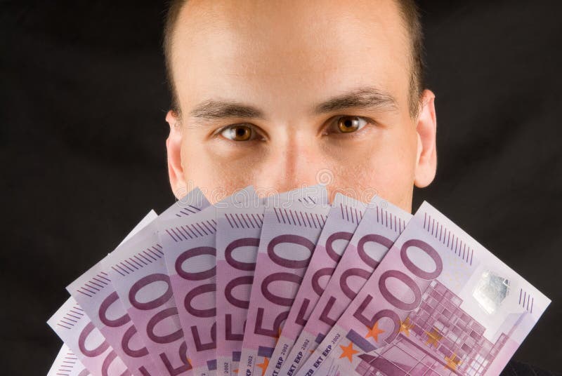 Mann-Holding-Geld stockfoto. Bild von gesicht, bargeld - 9975818