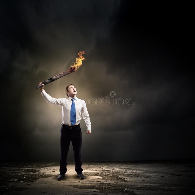 Mann mit Fackel stockfoto. Bild von karriere, tapfer - 43987912