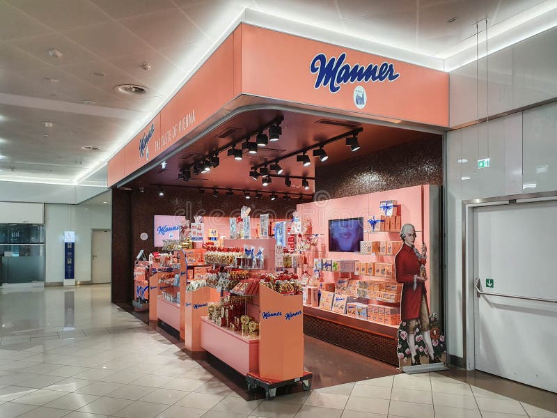 Manner shopfront in Vienna editorial photo. Image of schwechat - 262471226