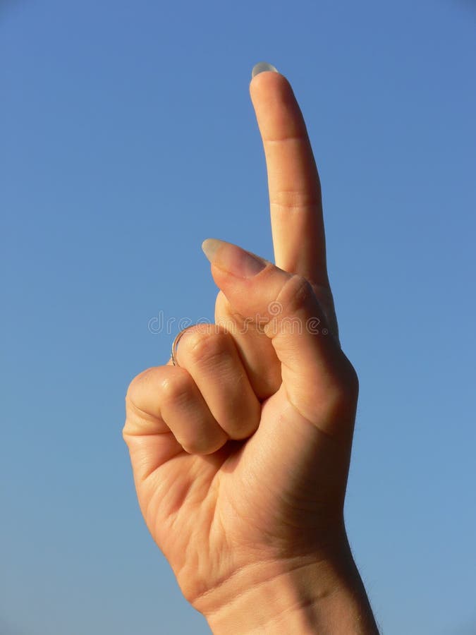 Mano che mostra l'indice fotografia stock. Immagine di bronzato - 5048780