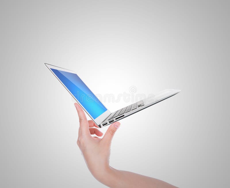 Mano Che Tiene Un Laptop Sottile Fotografia Stock - Immagine di mano ...