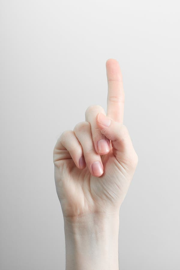 Mano con el dedo índice foto de archivo. Imagen de medio - 24416424