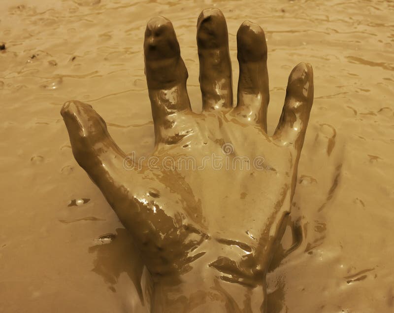 Mano en fondo del fango foto de archivo. Imagen de retroceder - 52546476