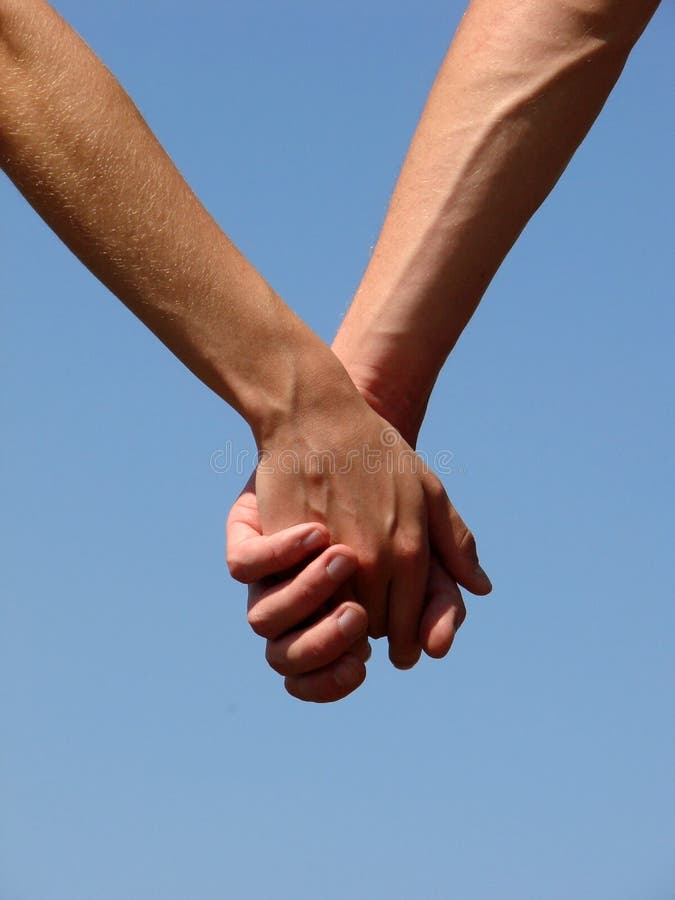 Mano en una mano foto de archivo. Imagen de edad, amor - 3531156