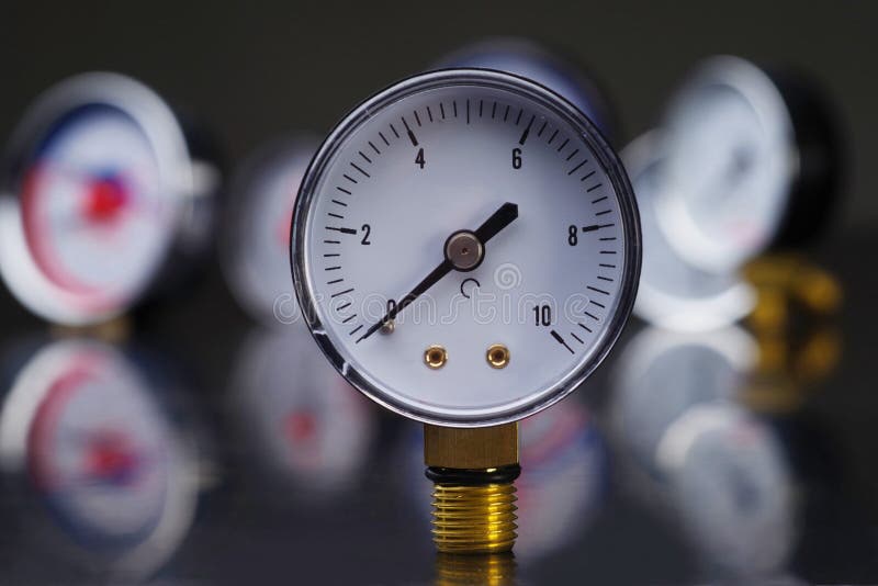 Manometer in Focus. a Pressure Gauge on the Background of Other ...
