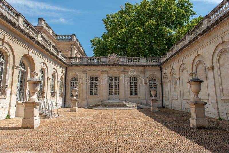 Manor courtyard in Avignon stock photo. Image of courtyard - 147108084