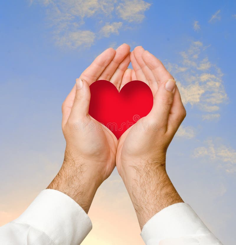 Manos que dan el corazón foto de archivo. Imagen de fondo - 16512468