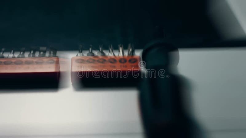 Mans Hand Assembling Screwdriver Set Stock Video - Video of close ...