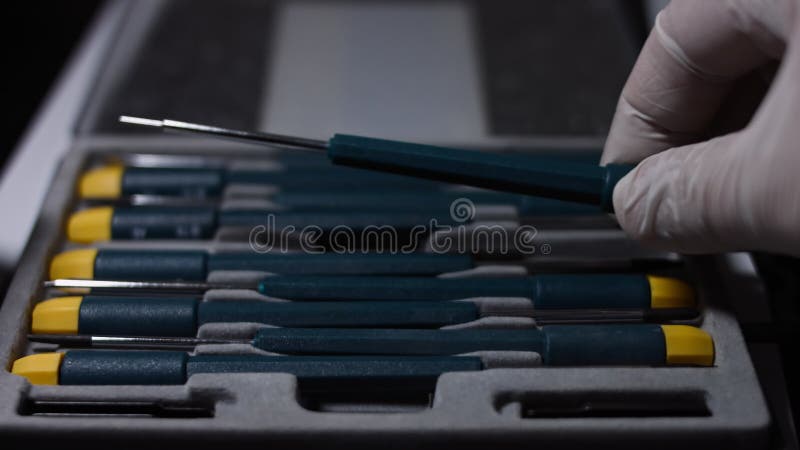Mans Hand Assembling Screwdriver Set Stock Footage - Video of shallow ...