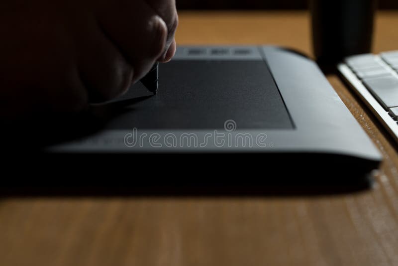 Mans Hand Drawing on a Computer Graphics Tablet Stock Image - Image of ...