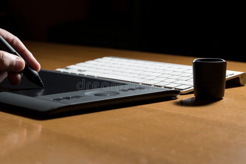 Mans Hand Drawing on a Computer Graphics Tablet Stock Photo - Image of ...