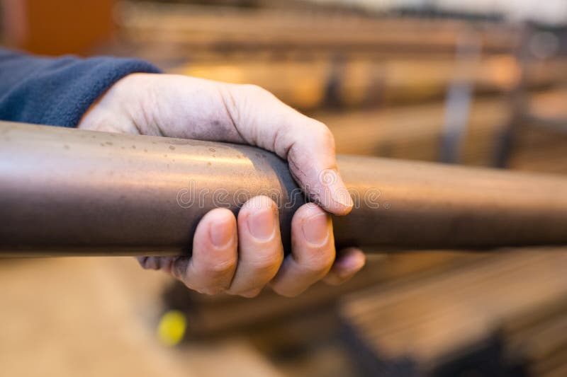 Mans Hand Holding Metal Pole Stock Photo - Image of company, metal ...