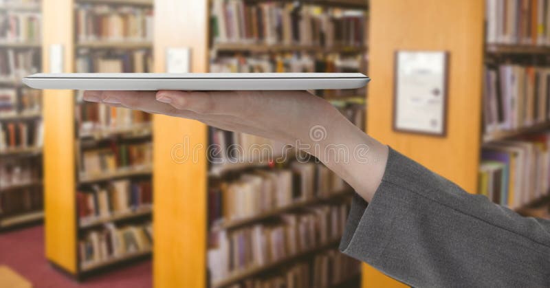 Mans Hand Holding Tabet in Library Stock Image - Image of entrepreneur ...