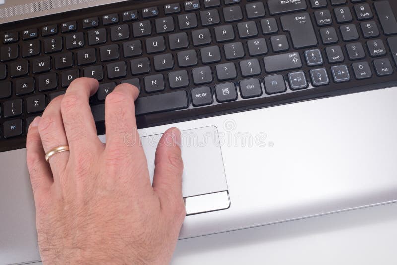 Mans Hand with Ring Typing on Laptop Keyboard Stock Photo - Image of ...