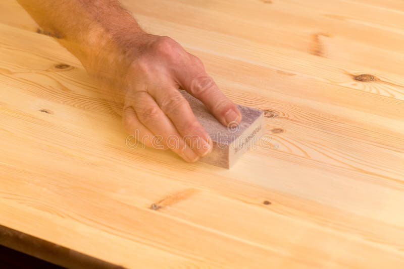 Mans Hand on Sanding Block on Pine Wood Stock Photo - Image of indoor ...