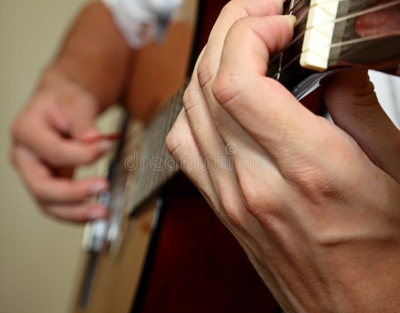 Mans hands playing guitar stock photo. Image of strings - 11498894