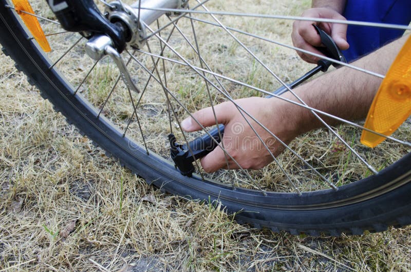 Bicycle Boot Pump stock photo. Image of hand, gloves - 121653146