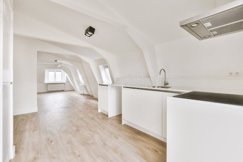 Mansard open plan kitchen stock photo. Image of flat - 249392860