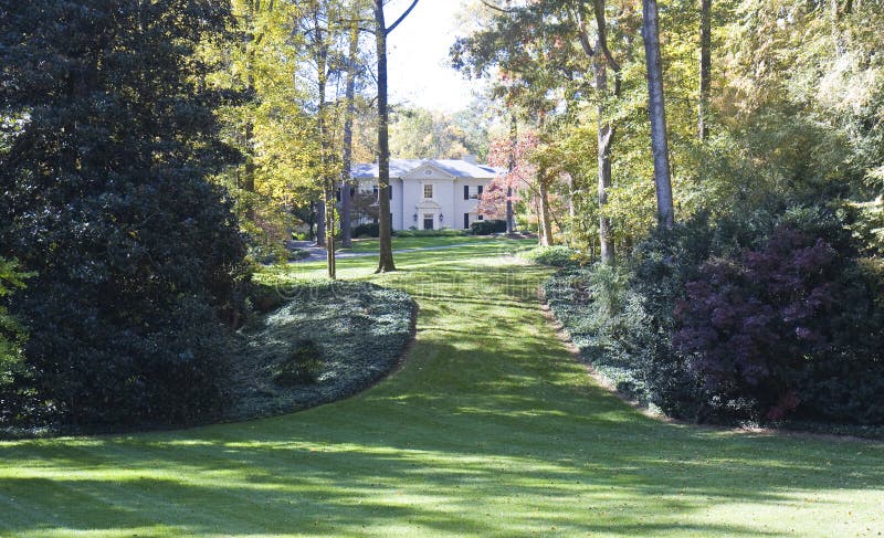 Mansion through Grassy Lane Stock Image - Image of architecture, house ...
