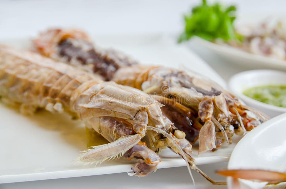 Mantis Shrimps with Tomatoes Stock Photo - Image of gourmet, cooked ...