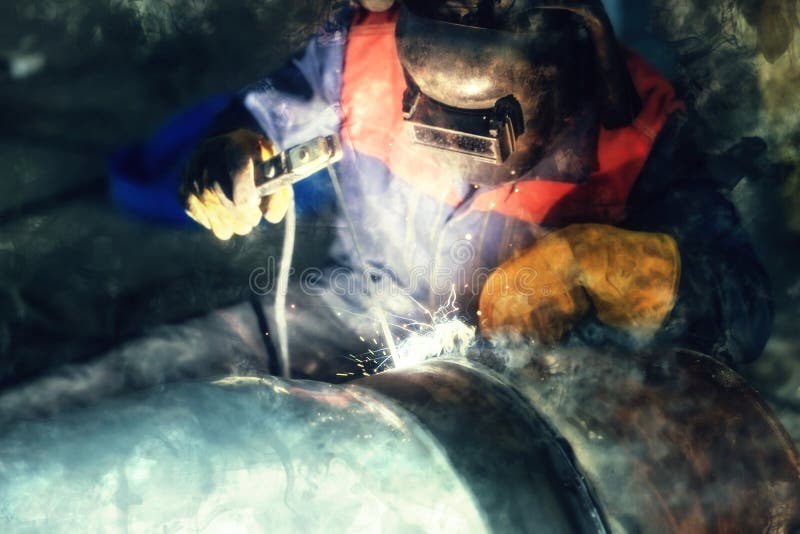Manual Arc Welding of Large Diameter Pipeline Elements Stock Photo ...