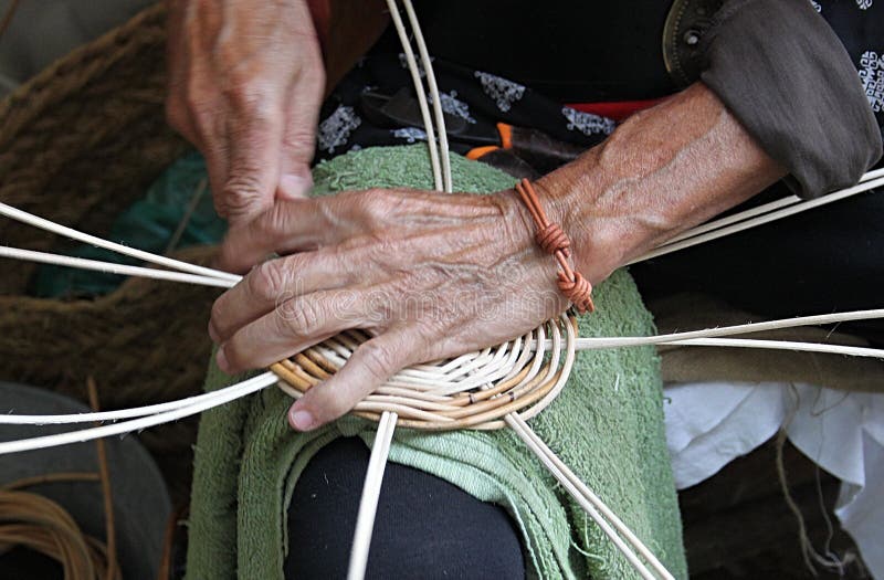 Artisan basketry stock image. Image of wicker, person - 128490831