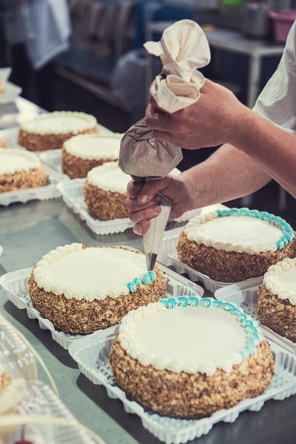 Manual cakes production stock photo. Image of business - 94874936