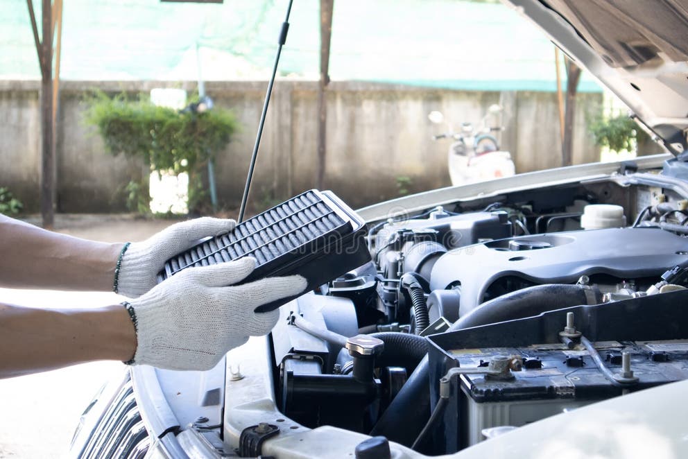 Manual Car Air Filter Replacement To Maintain Engine Performance.Air ...