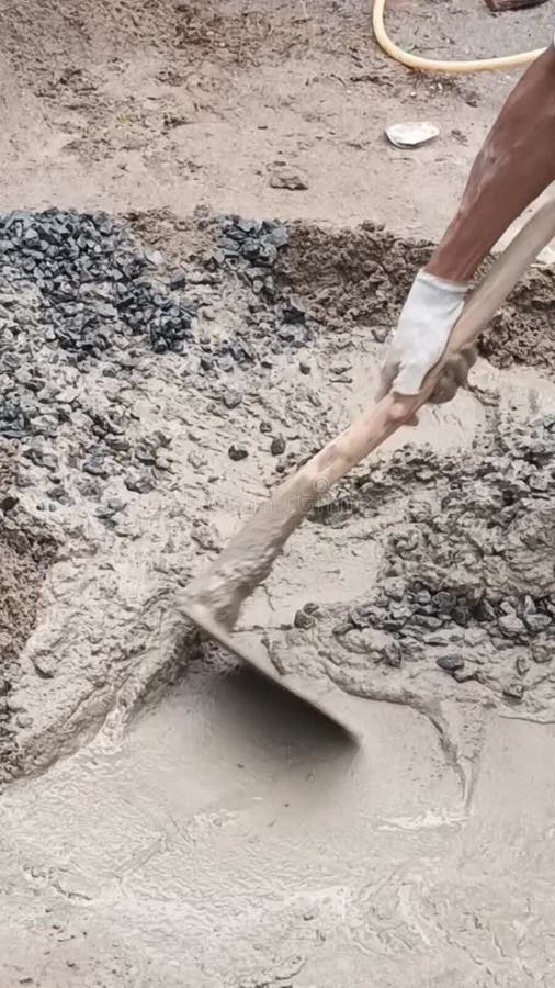 Manual Cement and Sand Mixing Process for Construction Stock Footage ...