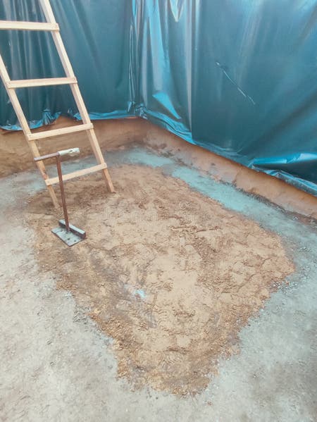 Manual Compaction of Soil, Compaction of Soil in a Pit for the ...